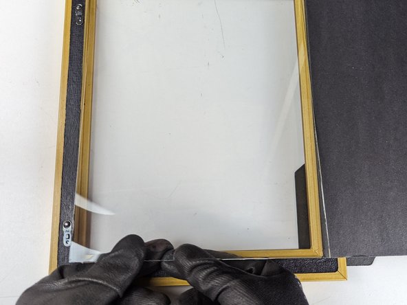 Replacing glass in picture frame store
